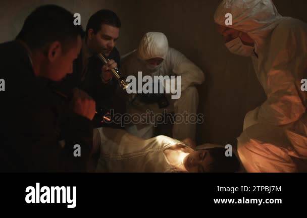 4K Police detectives and forensics team investigating dead body at ...