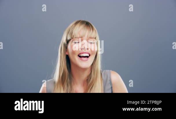 Funny, face and woman in studio laughing for joke, good mood and emoji ...