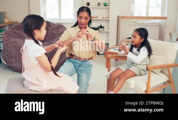 Learning, sign language and mother with children in home for ...