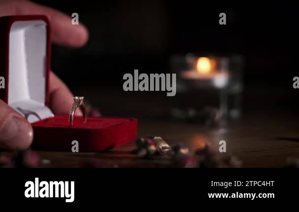 Guy gives an engagement ring to his bride. Proposal, marriage and ...