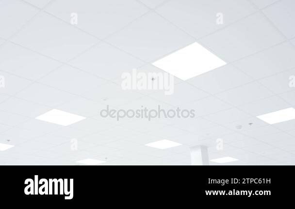 Empty interior of large modern data centre with rows of server racks ...