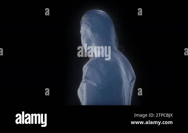 Medium video of a glowing female, woman figure, ghost, poltergeist ...