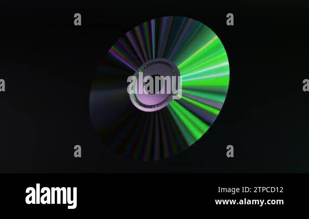 Abstract concept. CD DVD disc on a black isolated background. Neon blue ...