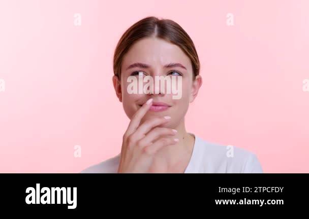 Contemplative woman face lights up with a spark of inspiration, eyes ...