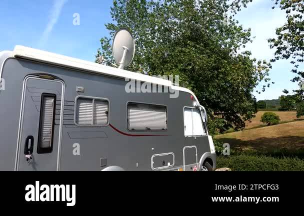 Exeter, uk. 07-14-22. Motorhome satellite dish is retracted neatly back ...