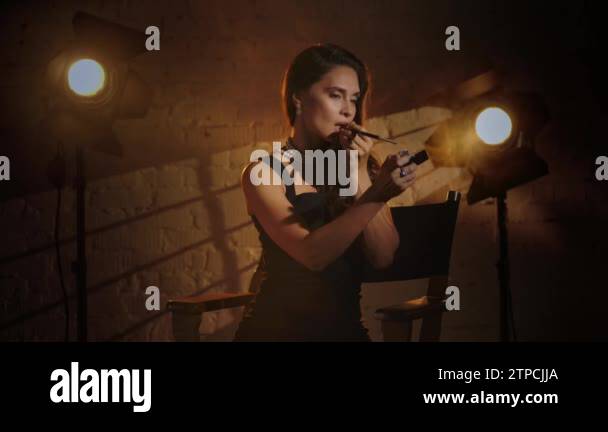 Cinematography and movie stage set backstage creative concept. Woman in ...