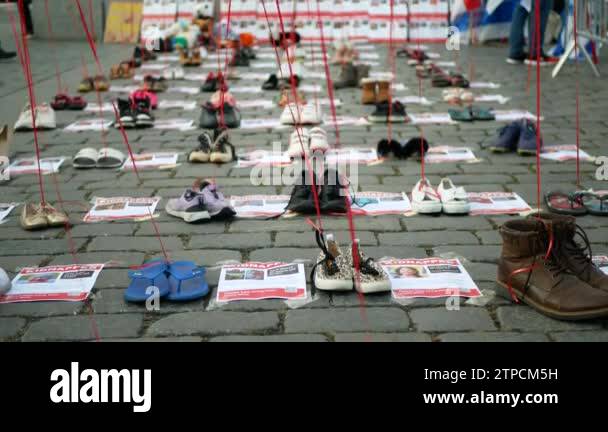 Demonstration Israel activist banner face boots people against ...