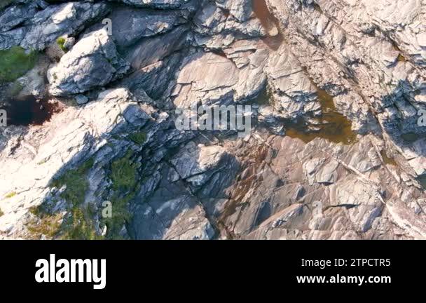 Top-down view of cliffs of Malin Head Coastal Walk, path west from ...