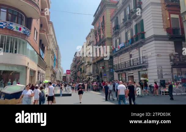 Via dei Tribunali central busy street in Napoli old town. Italian ...