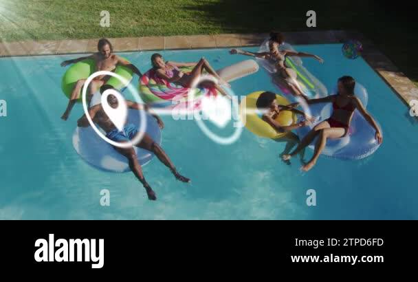 Animation of flowchart of icons over diverse friends on inflatable ...