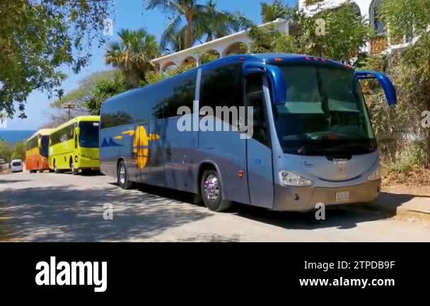 Puerto Escondido Oaxaca Mexico 25. March 2023 Various colorful buses ...