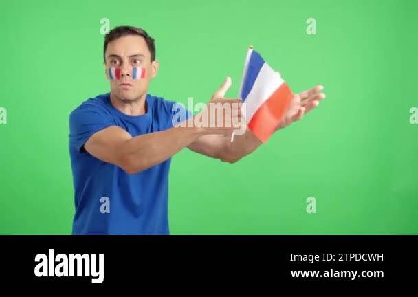Video in studio with chroma of a man looking away waving a french ...