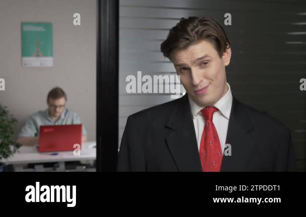 Young successful man in a suit shows contempt, mistrust, distrust ...