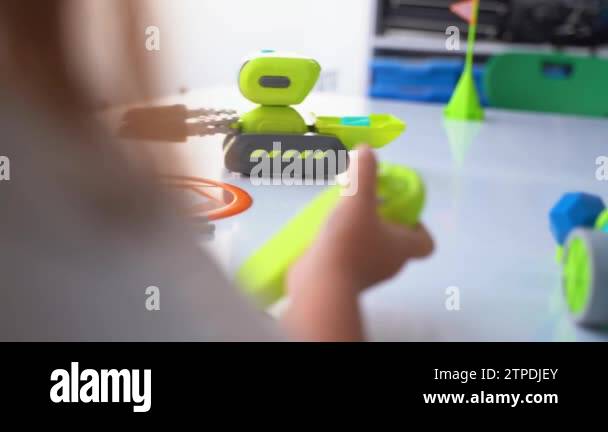 Children playing with toy car control panel in STEM educational class ...