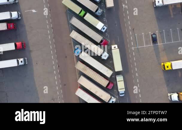 Aerial Shot of Truck with Attached Semi Trailer Leaving Industrial ...