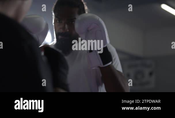 Dramatic Slow-Motion Standoff - Fighter with Boxing Gloves in Ring ...