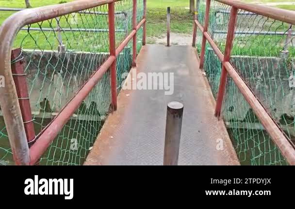 bridge crossing the outdoor concrete drainage system at the city street ...