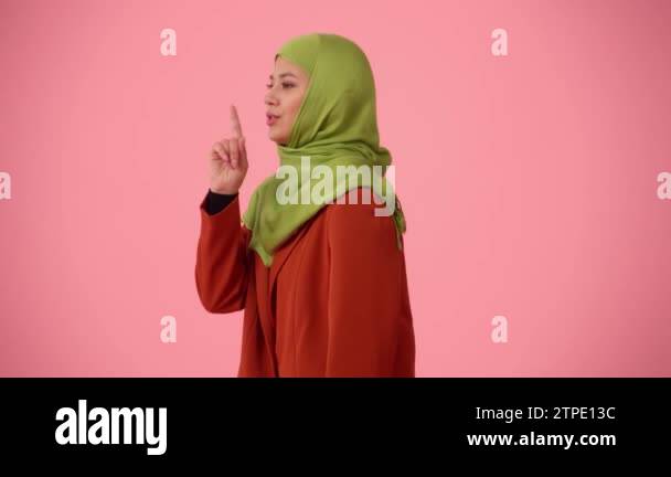 Medium side profile isolated video capturing an attractive young woman ...