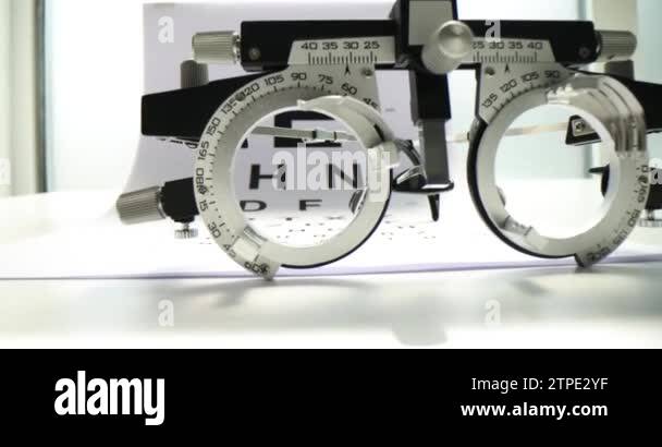 Eye chart test and trial frame ophthalmologist tools. Farsightedness ...