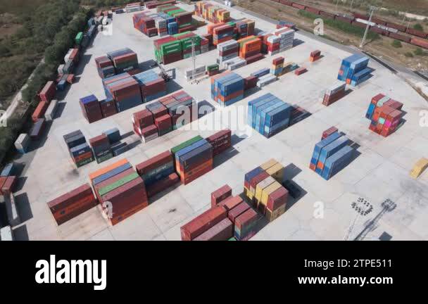 aerial top view of a container terminal at the port, where massive ...