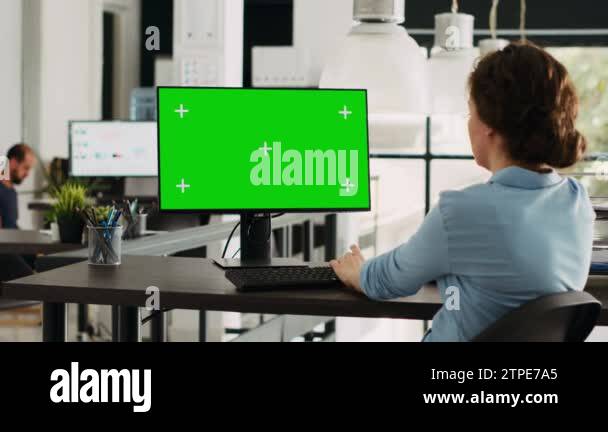 Startup Manager Using Greenscreen Display On Computer At Workstation