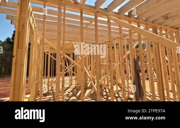 There are beams of wood stick framing to framework new house in ...