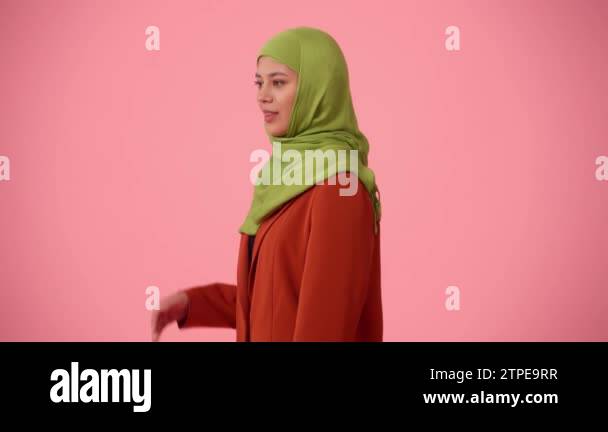 Medium side profile isolated video capturing an attractive young woman ...