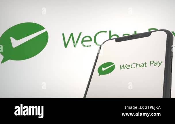 WeChat Pay app logo in mobile display screen and background editorial ...