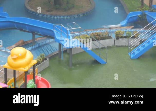 Childrens water slides and mini-water park in the hotel will rain down ...