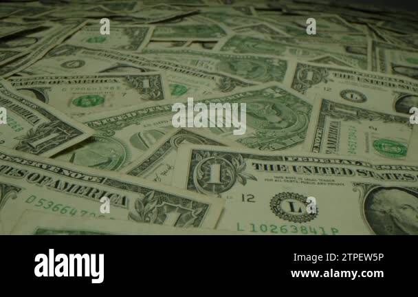American One Dollar Bills laid out on a table with a macro lens and ...