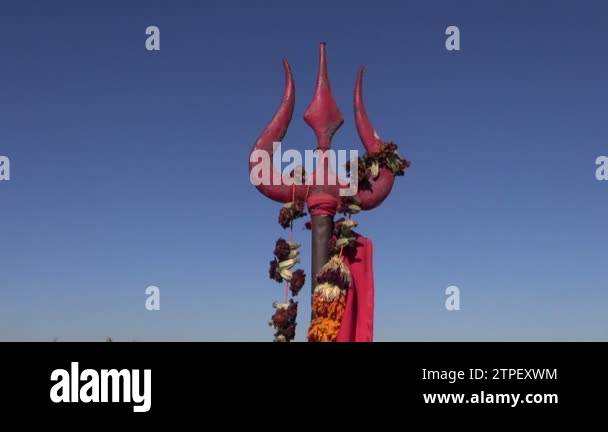 hindu god Shiva sacred trident and red flags In India Stock Video ...