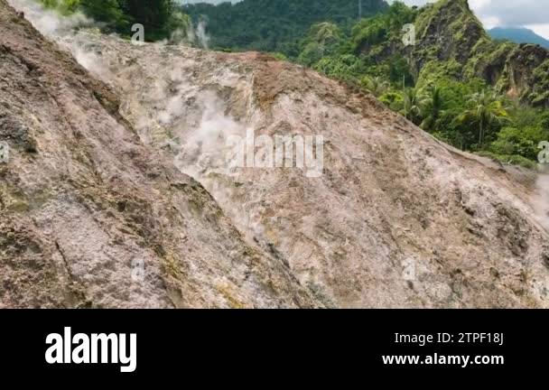 Volcanic activity and sulfur gases on the mountainside. Mag-Aso ...