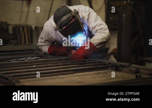 Man leaning over welding Stock Videos & Footage - HD and 4K Video Clips ...