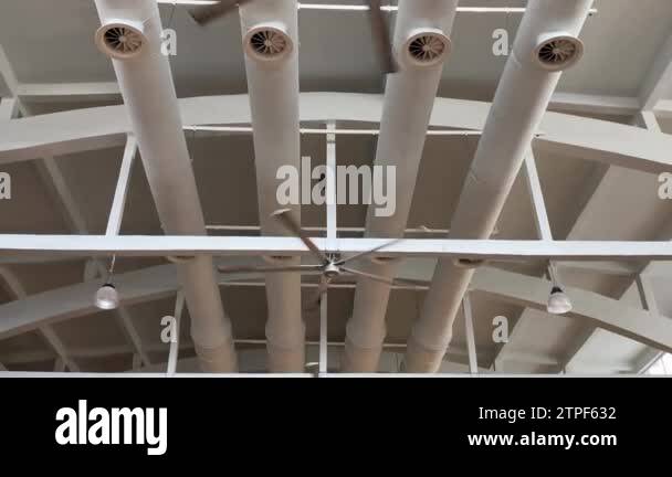 Ventilation system for a large room. Large fans are spinning Stock ...