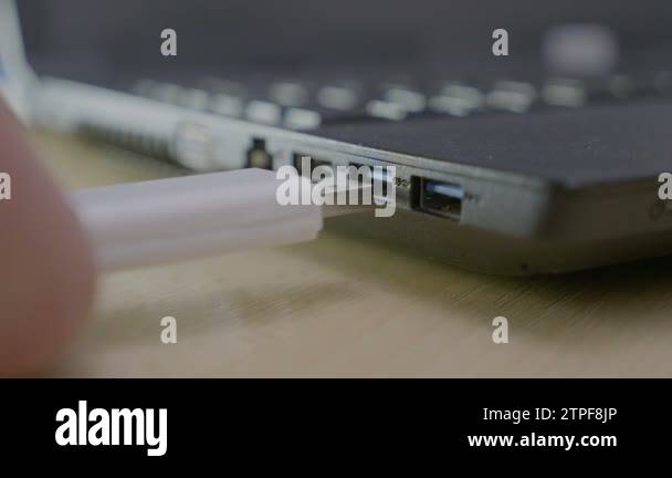 Plugging usb stick Stock Videos & Footage - HD and 4K Video Clips - Alamy