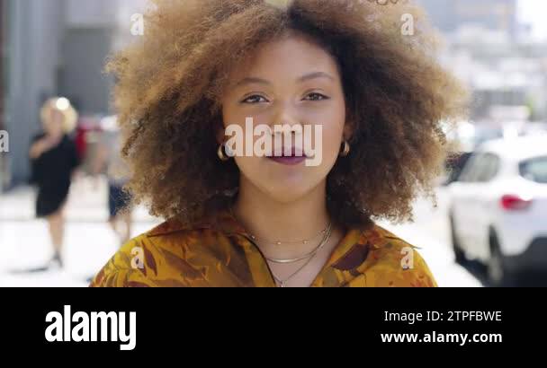 Interview, face and woman talking on city street with job question on a ...