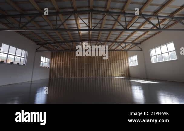 Spacious empty well-lighted hall for celebrating with wooden details ...