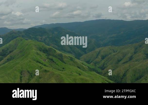 Mountains and green hills in Philippines. Slopes of mountains with ...