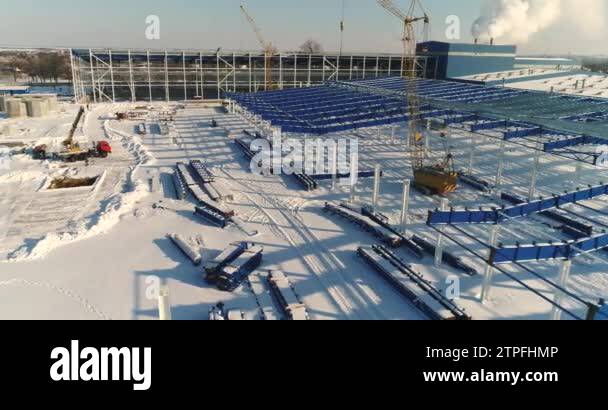 Construction of a modern factory or plant, Industrial area in winter ...