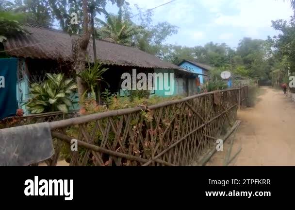 Structure of Assam village house, Simple house with small garden in ...