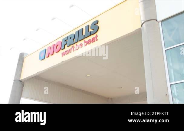 no frills wont be beat grocery store chain franchise logo sign on store ...