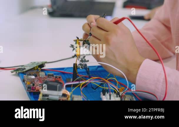 Close-Up of Young Professional Hands of Engineer Diagnosing Computer ...