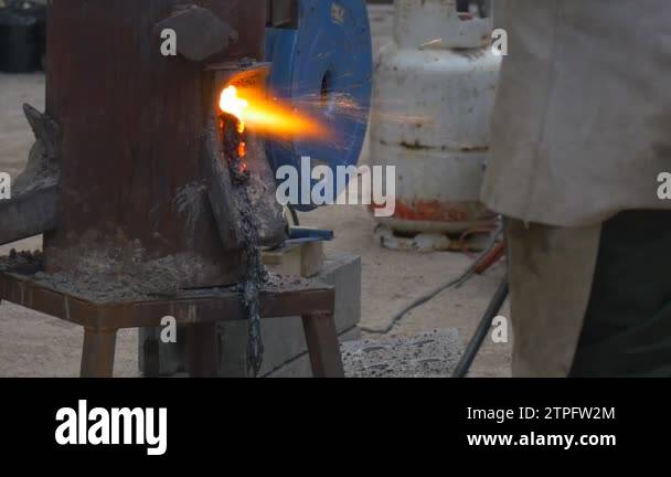 Furnace For Clay and Enamel Burning, Metal Molding. Workers Are Walking ...