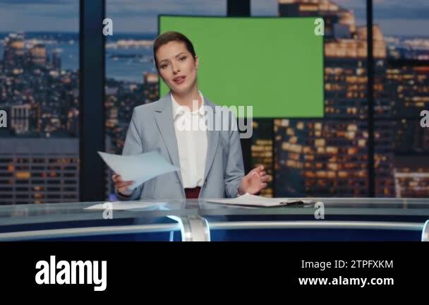 Female news presenter reporting in broadcasting studio. Positive woman ...