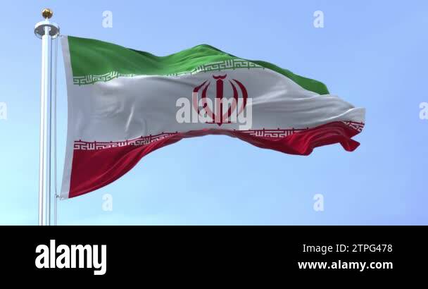 Islamic Republic of Iran flag waving on a clear day. Stripes of green ...