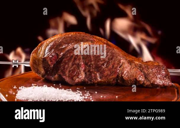 Meat Alcatra and chimarrao, traditional Brazilian barbecue with fire ...