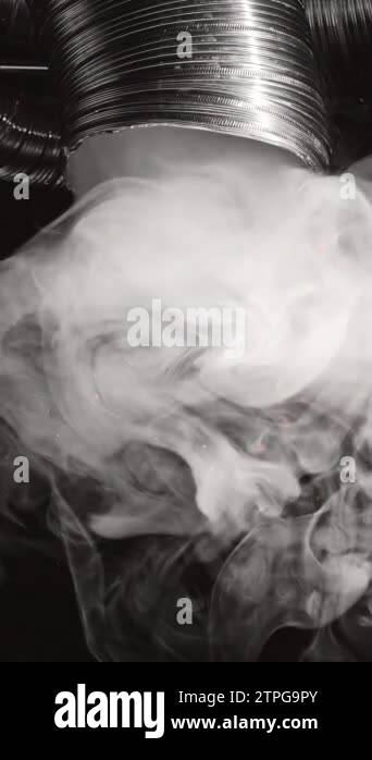 Vertical video. Gas exhaust. Fuel burn. Smog emission. White smoke ...