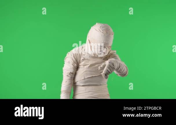 Green screen isolated chroma key video capturing a mummy smelling under ...