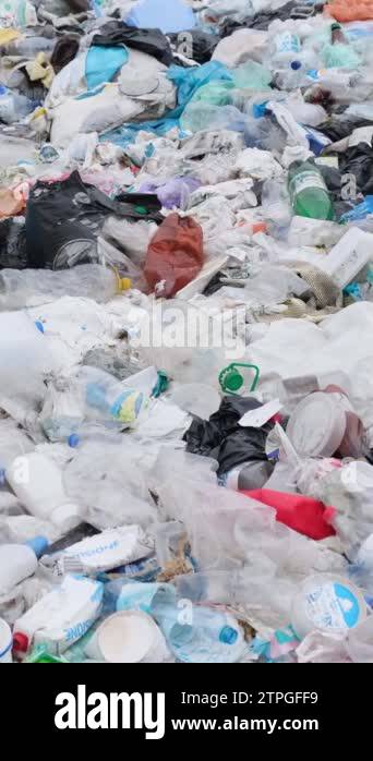 Plastic bottles on the seashore. Plastic bags. rubbish. Ecological ...