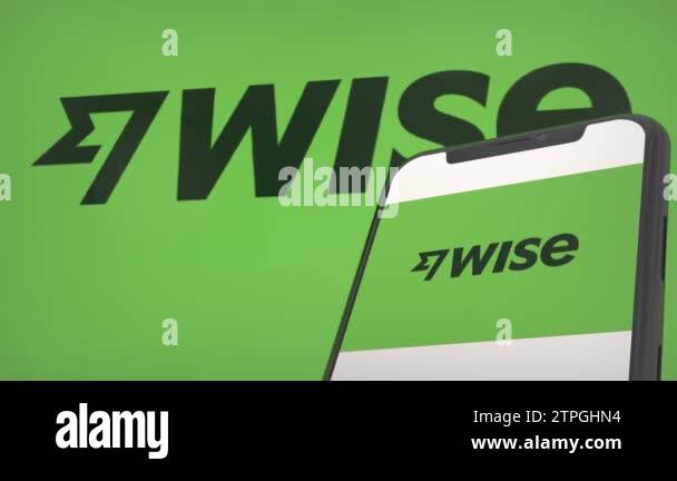 Wise app logo in mobile display screen and background editorial Stock ...